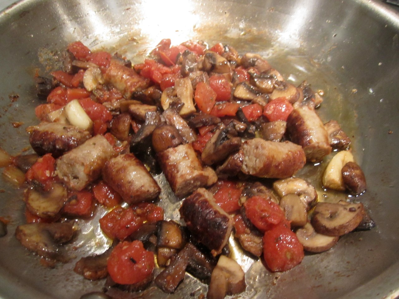 Beppi’s Luganiga Sausage with Mushrooms and Polenta | italianatedotcom